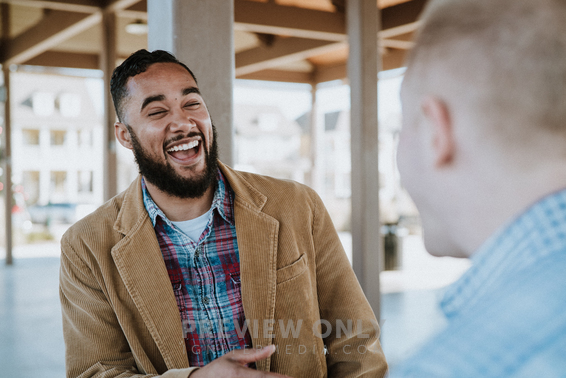 Two Men Greeting Each Other - Stock Photos | The Visual Folk Two Men Greeting Each Other - Stock Photos | The Visual Folk